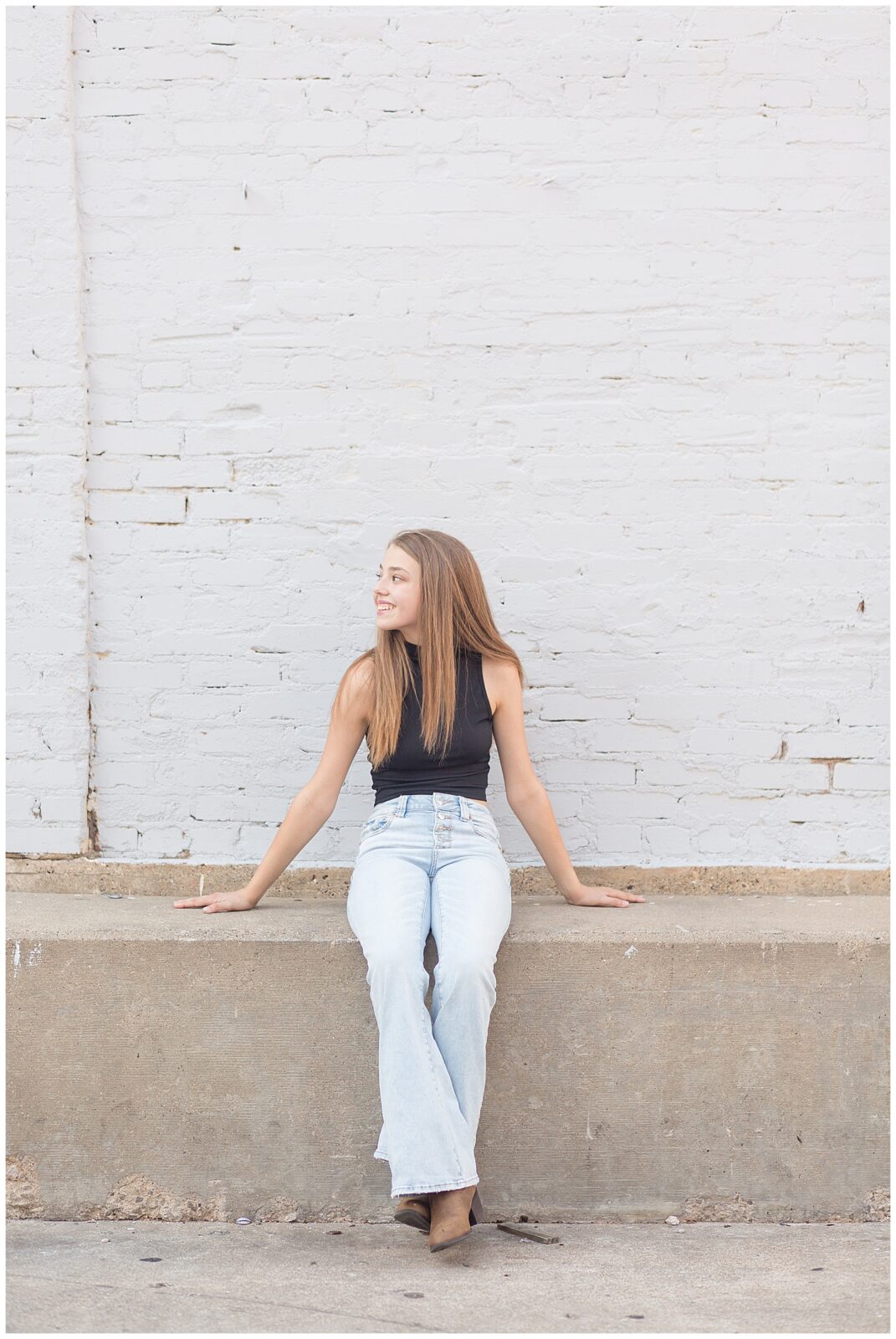 Plano Senior Photographer captures portraits in Downtown, TX